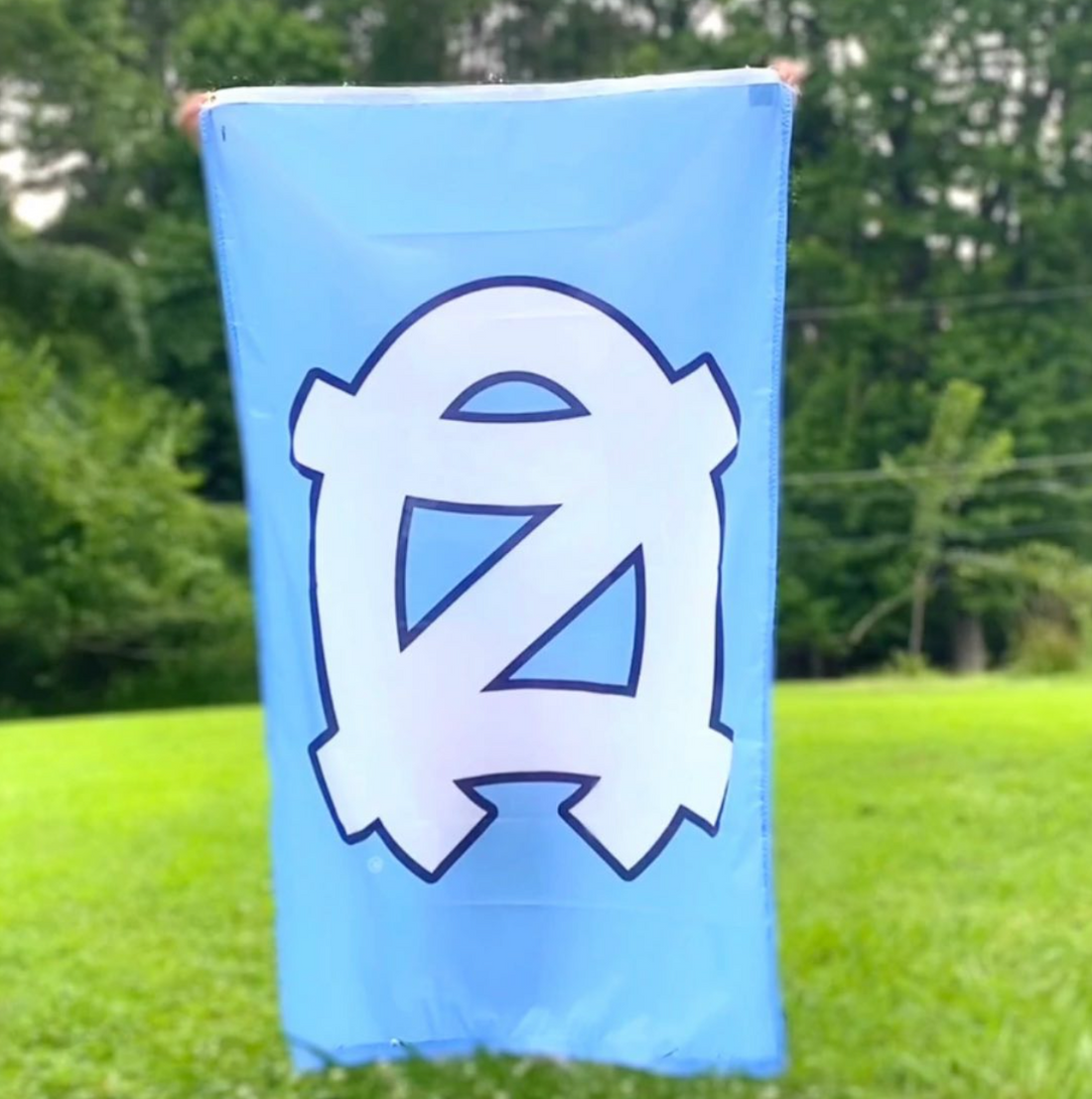 UNC Tar Heels Interlock Carolina Blue Flag 3x5 – Shrunken Head